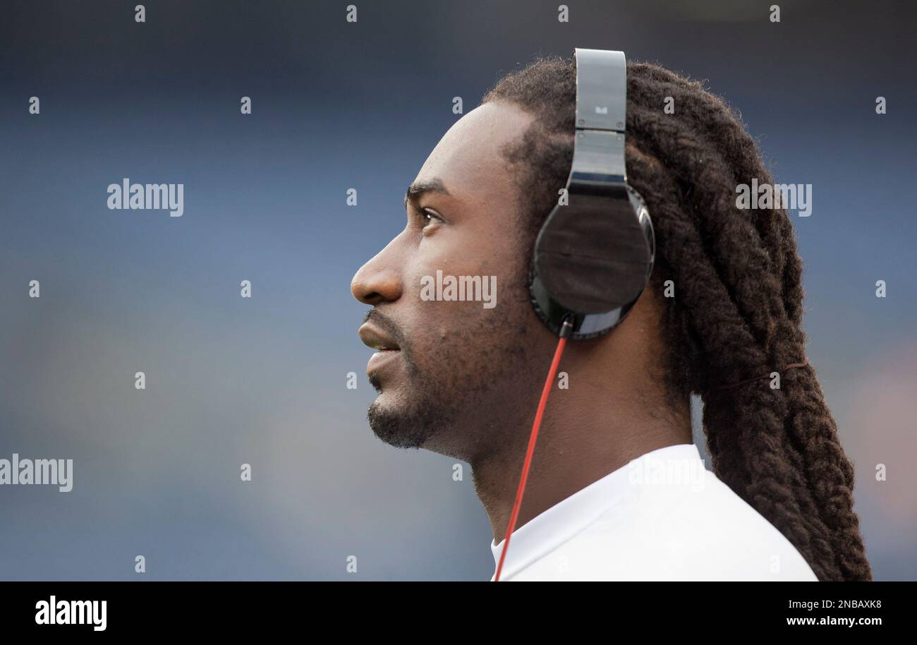 Seattle Seahawks' Isaiah Stanback walks around the field while warming ...