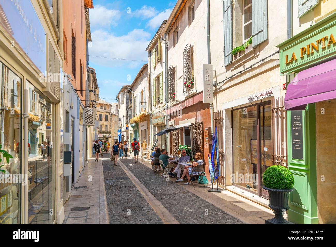 One of the many typical streets and alleys of colorful sidewalk cafes ...