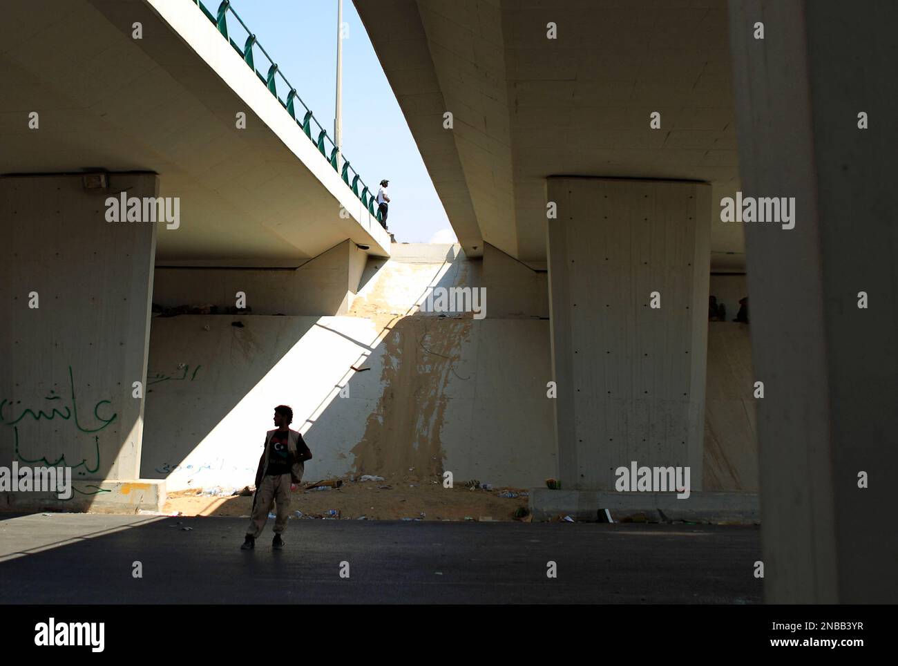 Rebel fighters seen at the checkpoint near the Tripoli International ...