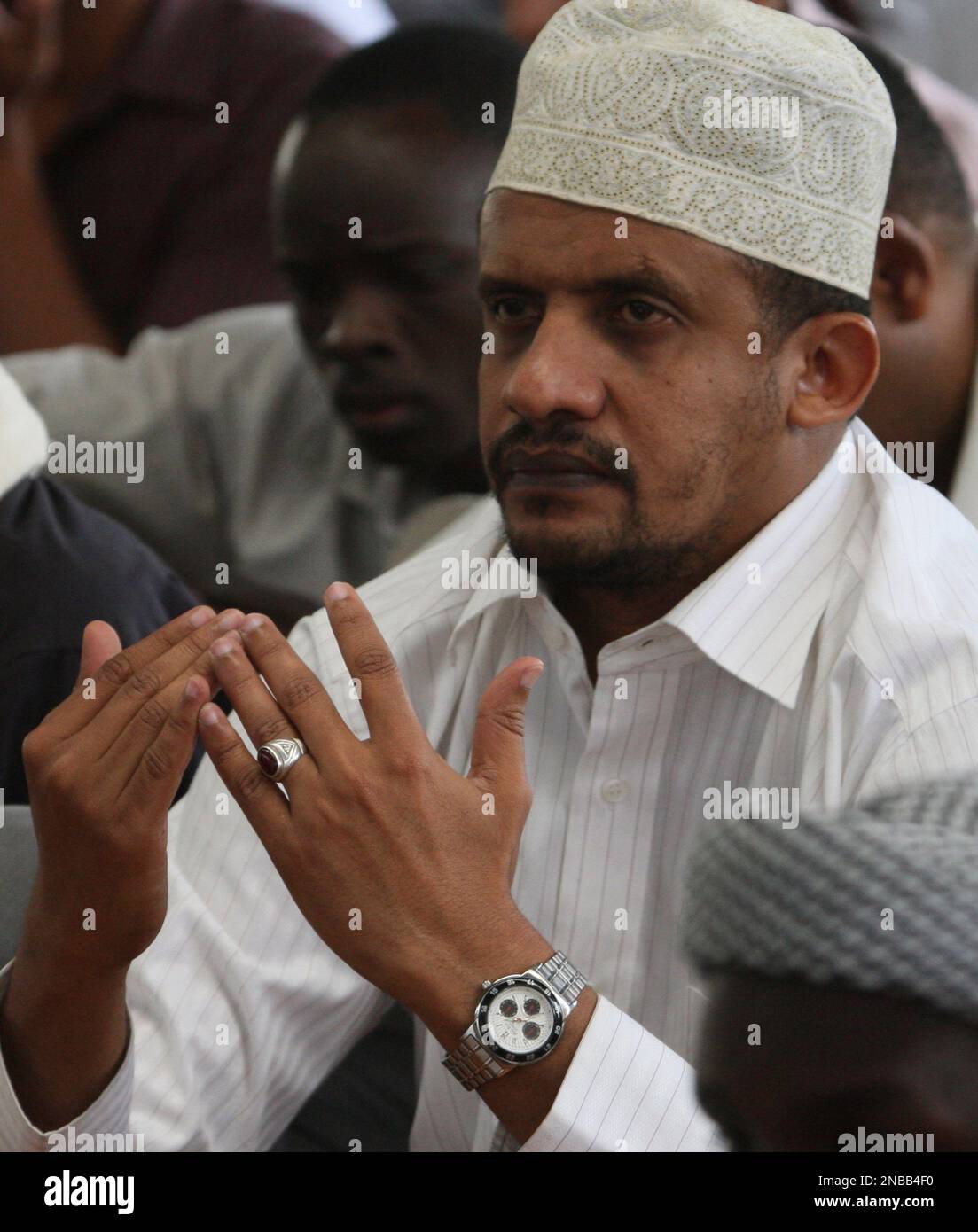 A Kenyan muslim in prayers during the last Friday of the holy month of ...