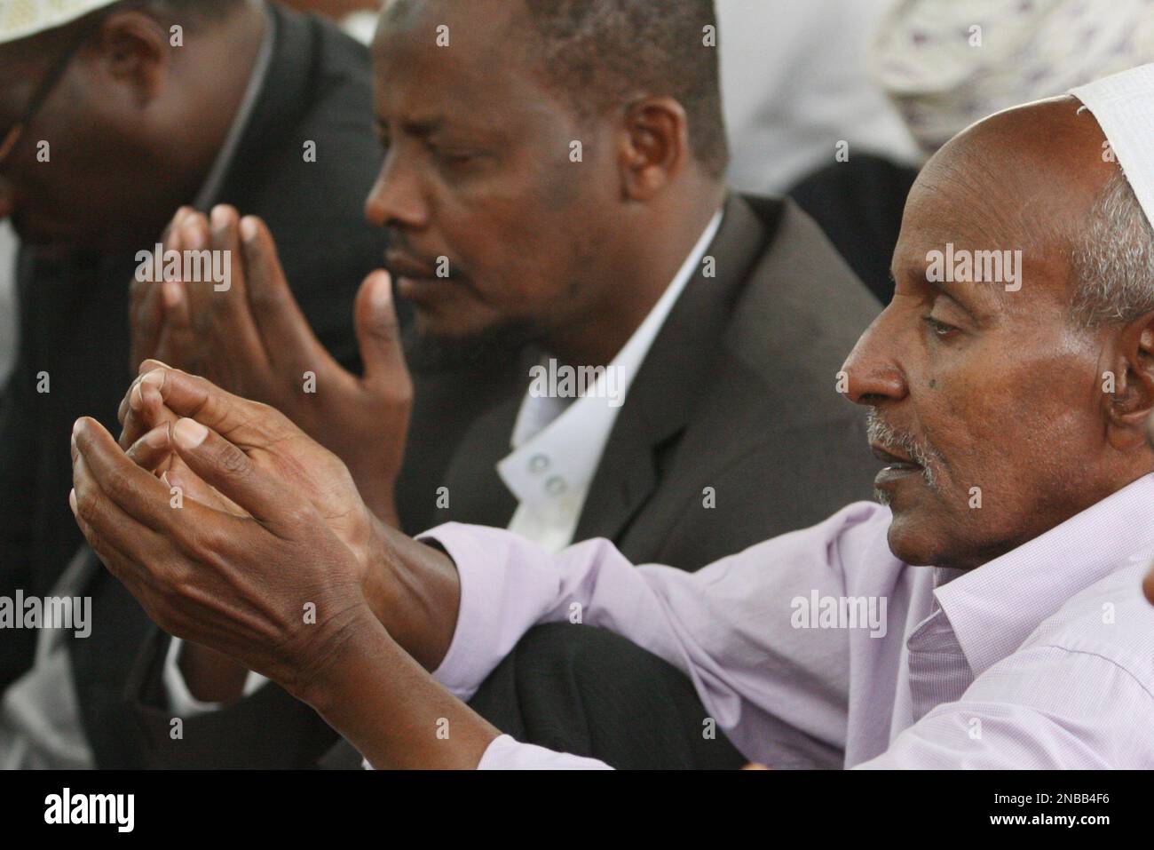 A Kenyan muslim in prayers during the last Friday of the holy month of ...