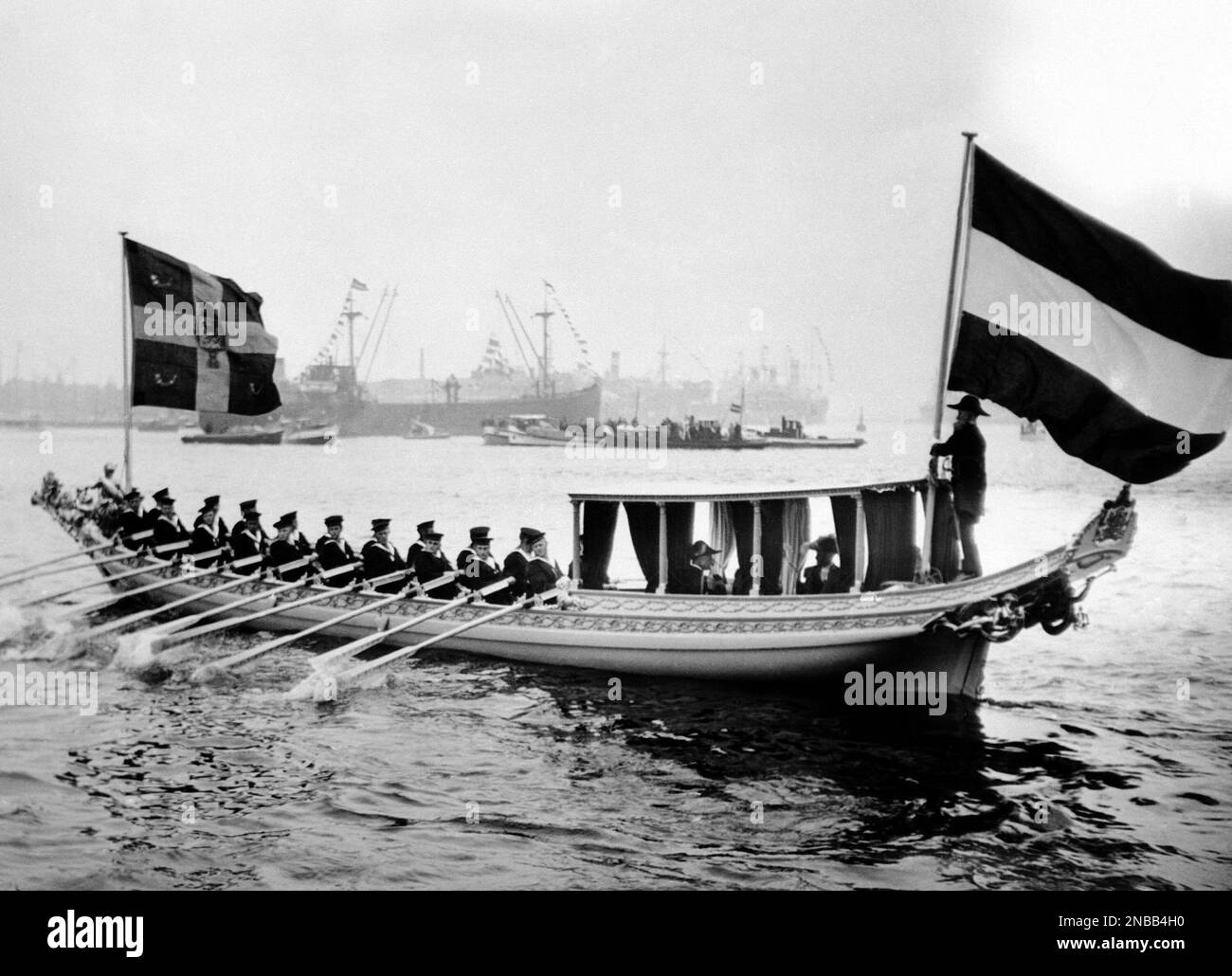 Queen Wilhelmina in the royal barge Sloep reviewed Dutch naval vessels ...