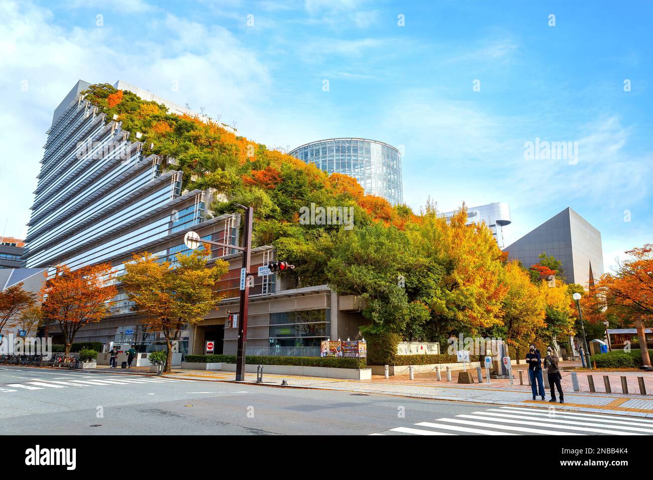 Fukuoka, Japan - Nov 21 2022: ACROS Fukuoka is a conventional office ...