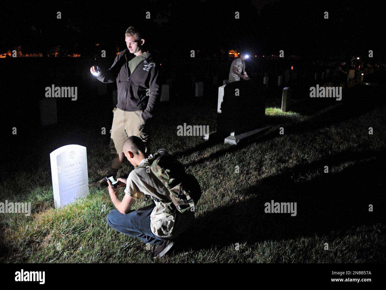 Army Pfc. Austin Johnson, 21, of Highland Ranch, Colo., left, takes a ...