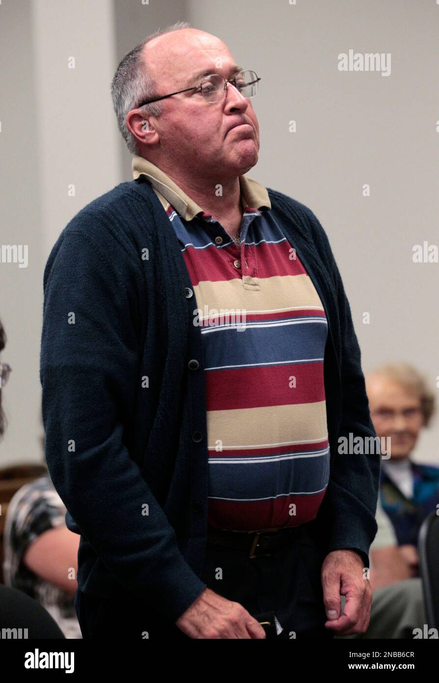 John P. Cushing Jr. stands at the conclusion of a court hearing brought ...