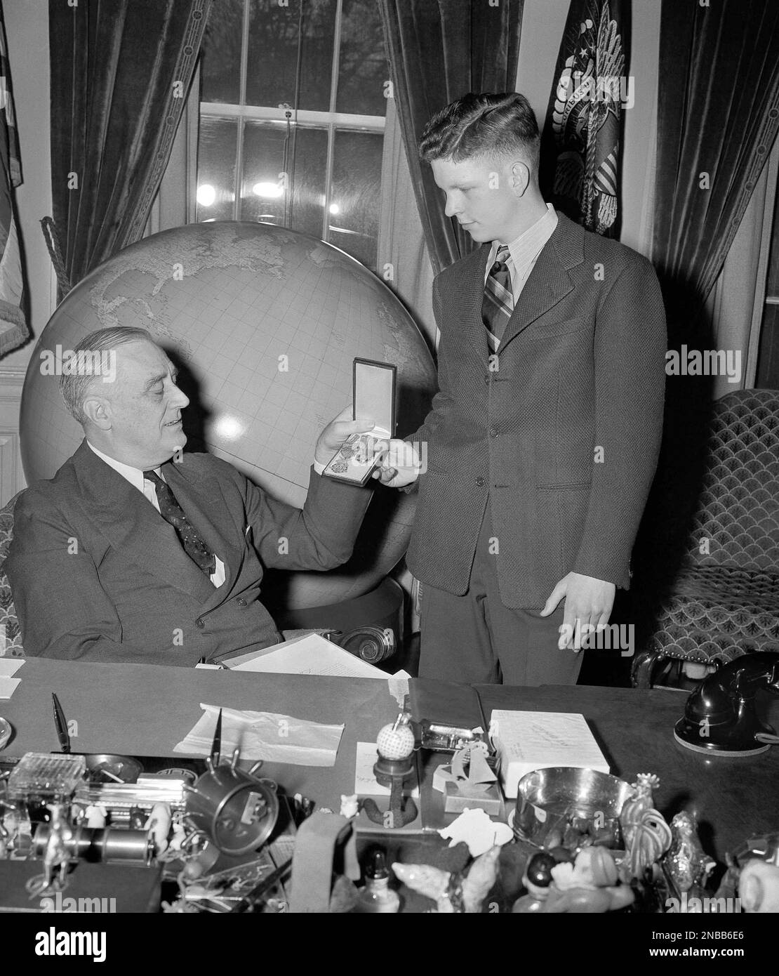 Kenneth N. Walker Jr., 16, of Glendale, Calif., receives from President ...