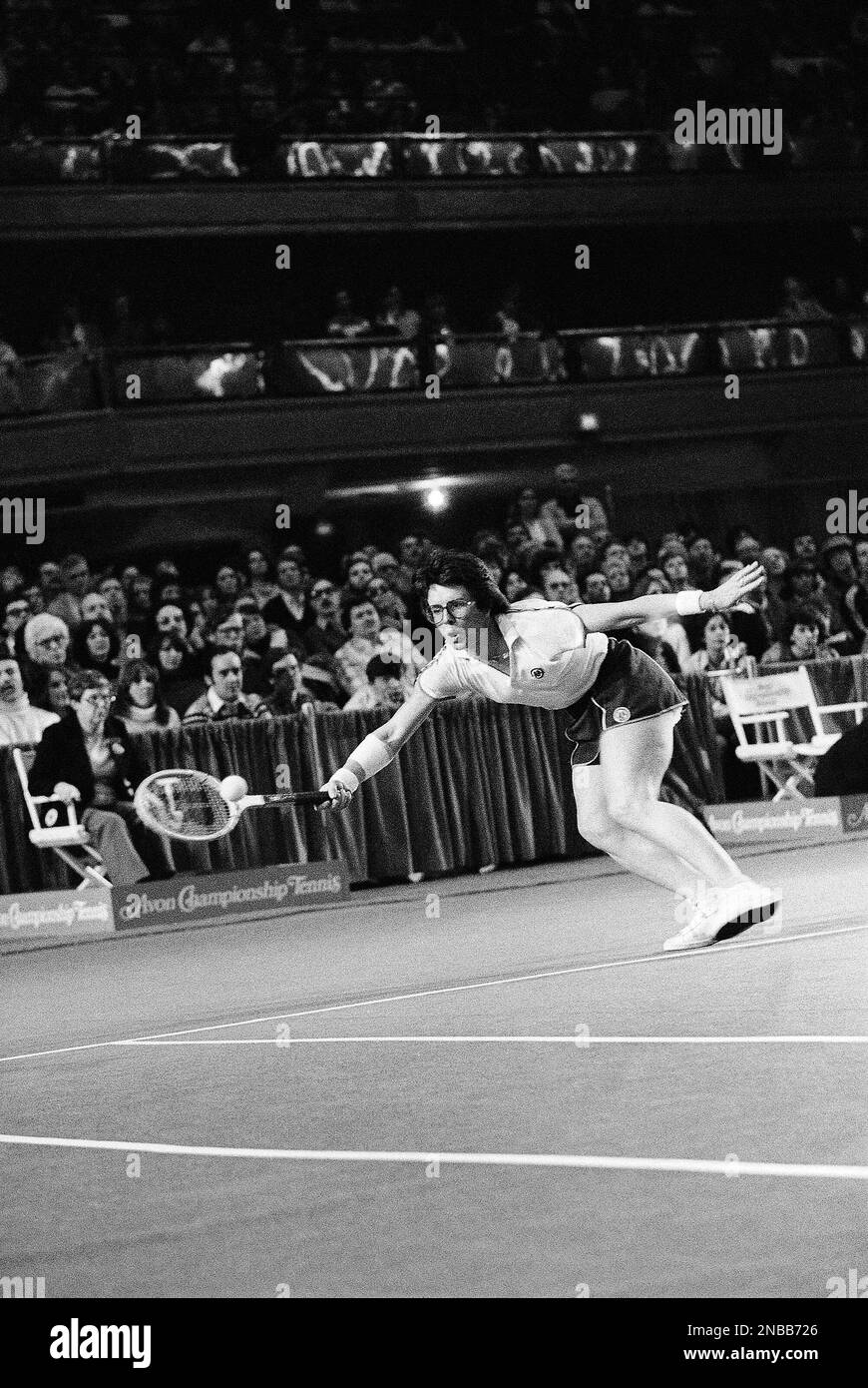Billie Jean King stretches to return a shot by Martina Navratilova (not ...