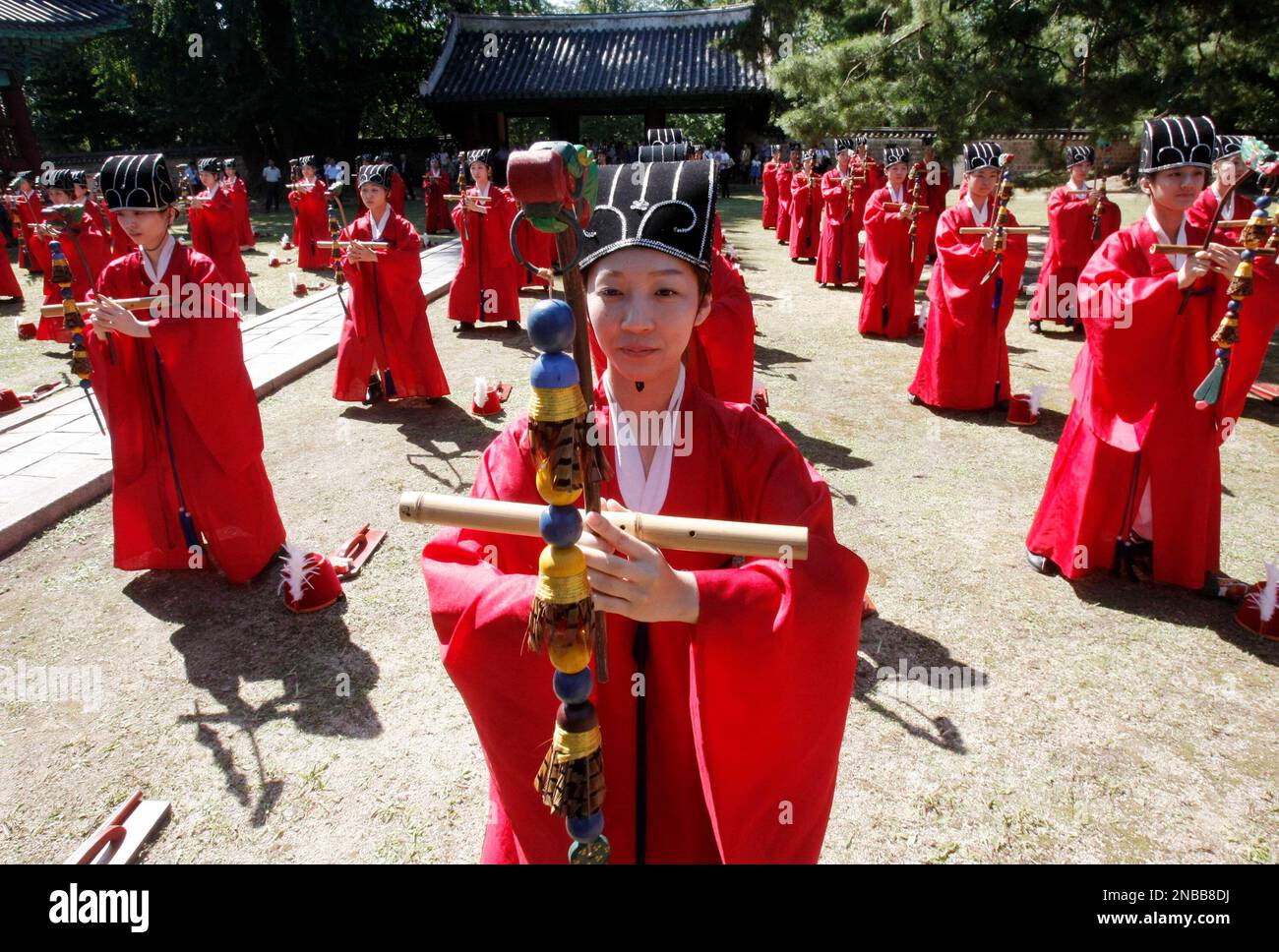 South Korean students wearing traditional Korean costumes perform ...