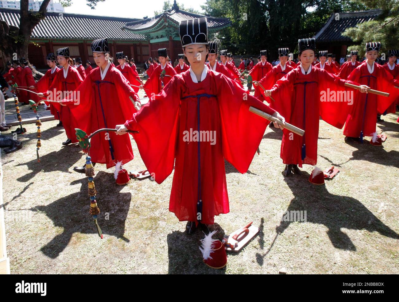 South Korean students wearing traditional Korean costumes perform ...