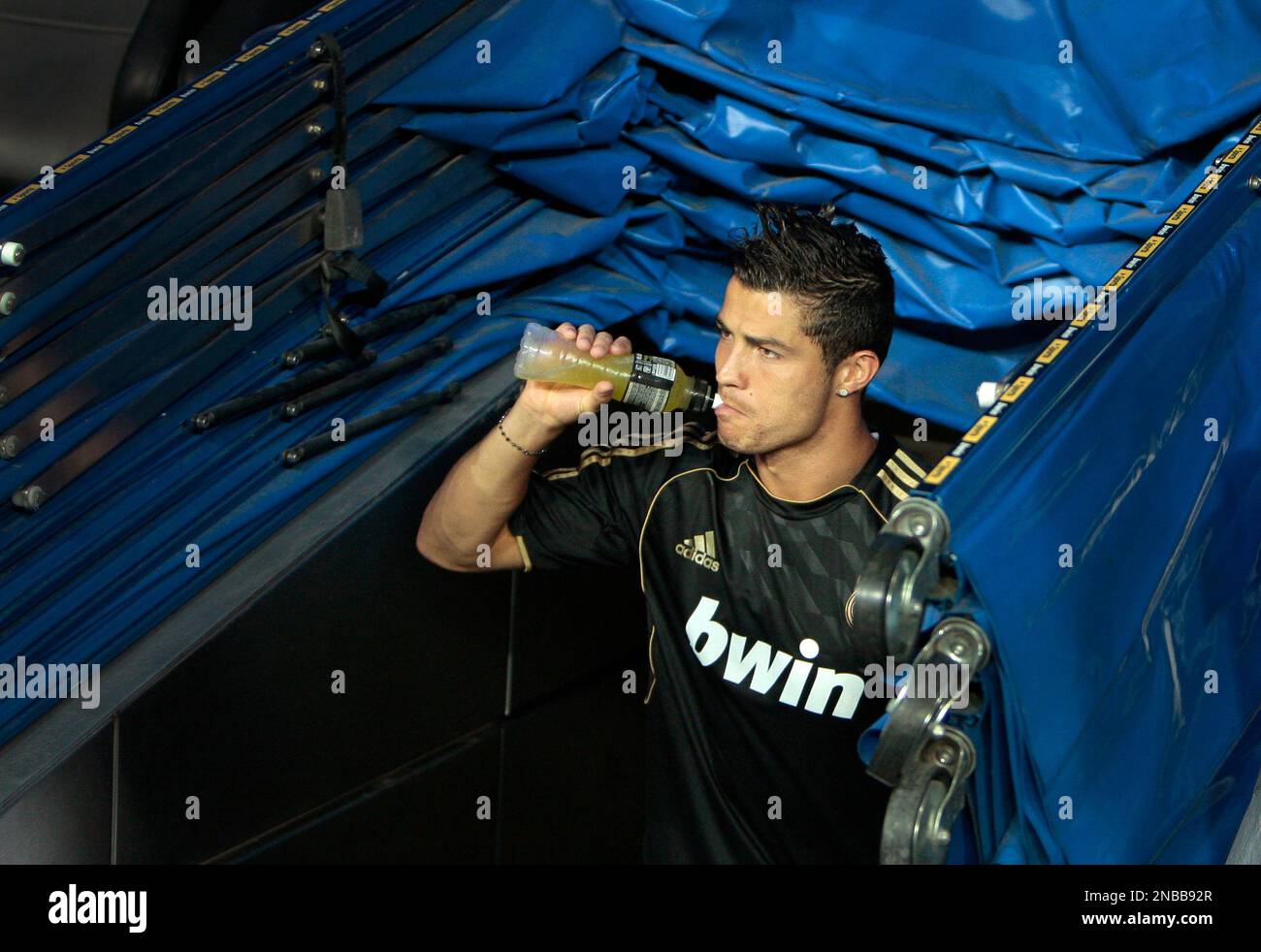 Real Madrid's Cristiano Ronaldo from Portugal quenches his thirst ...