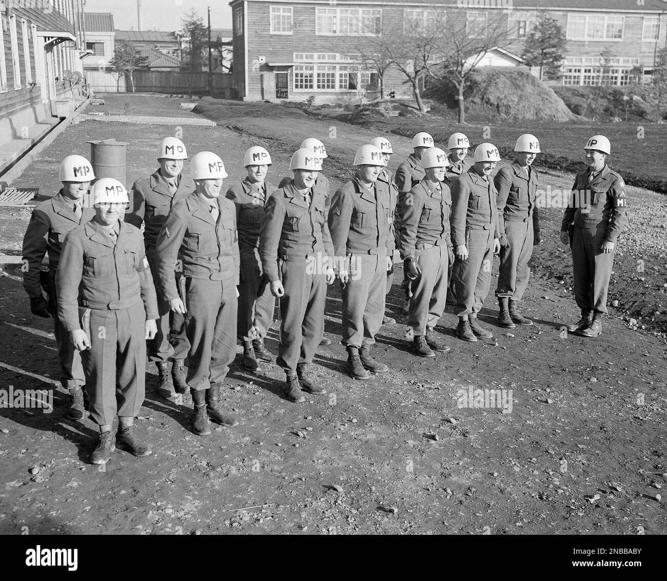 Ready to start out on foot and motor patrol these members of the 720th ...