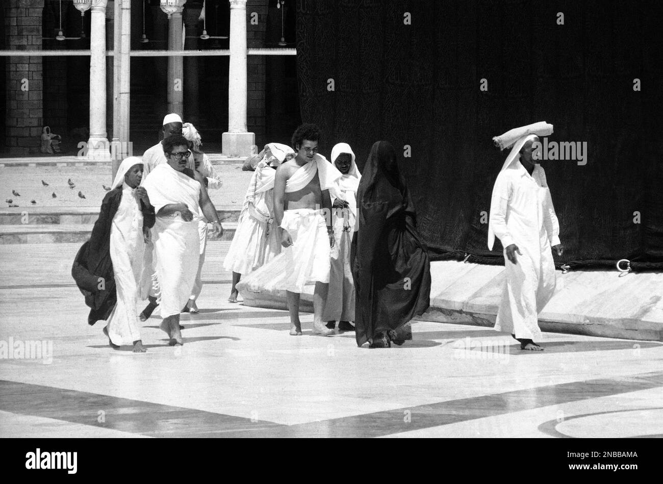 Veiled women and women in special garb, known as Ihram, on their way to ...