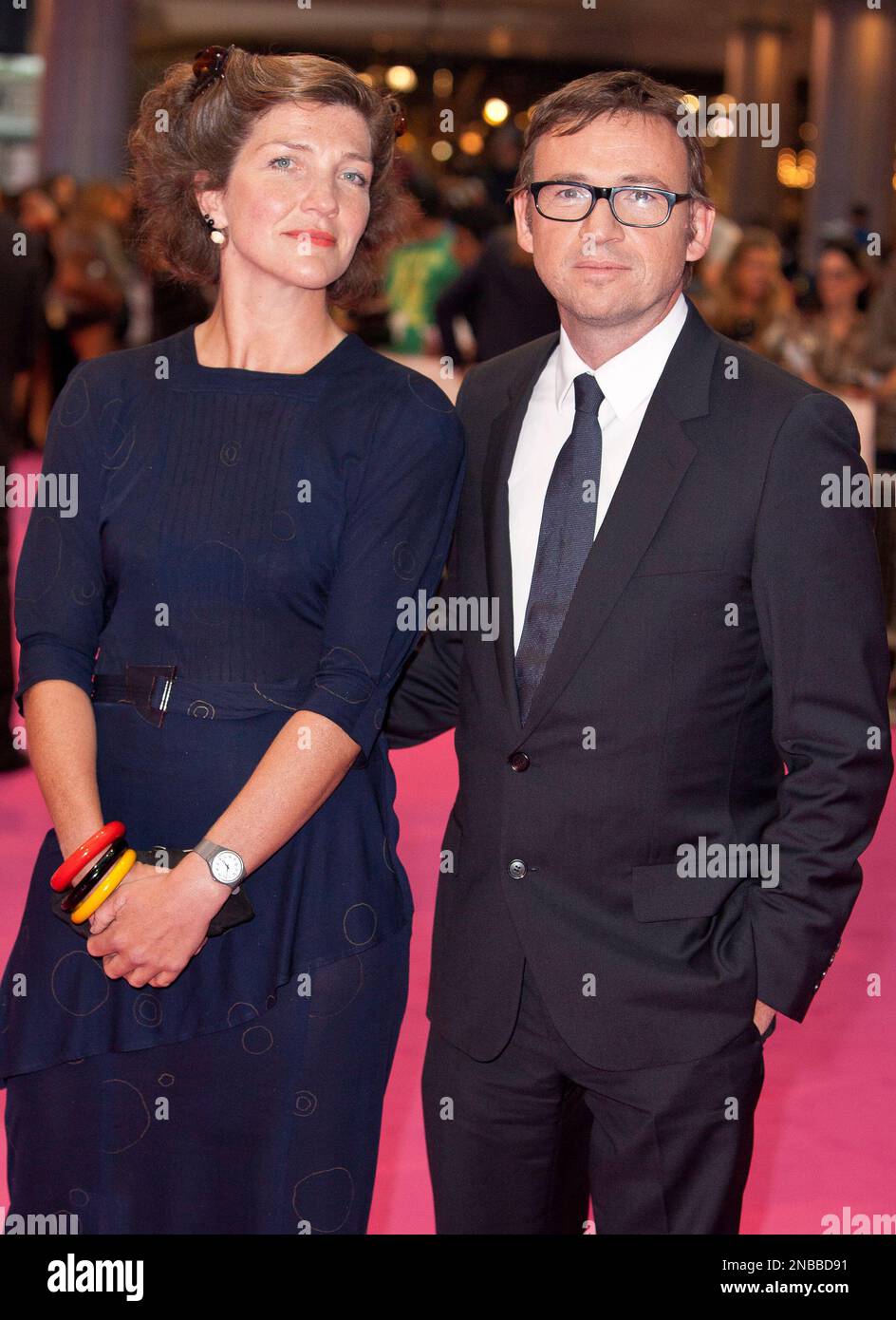 British author and screenwriter, David Nicholls, right, arrives with ...