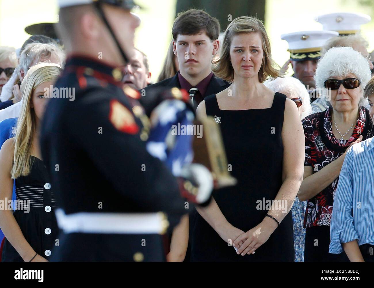 Leafa Palmer, second from right, widow of Marine Lt. Col. Benjamin J. Palmer of Modesto, Calif ...