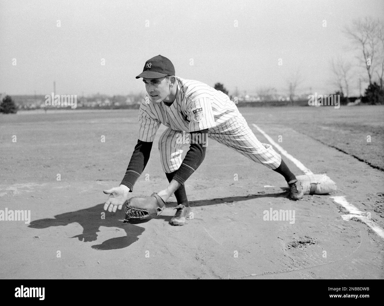 John Lindell, listed on the roster as a pitcher, displays a little ...