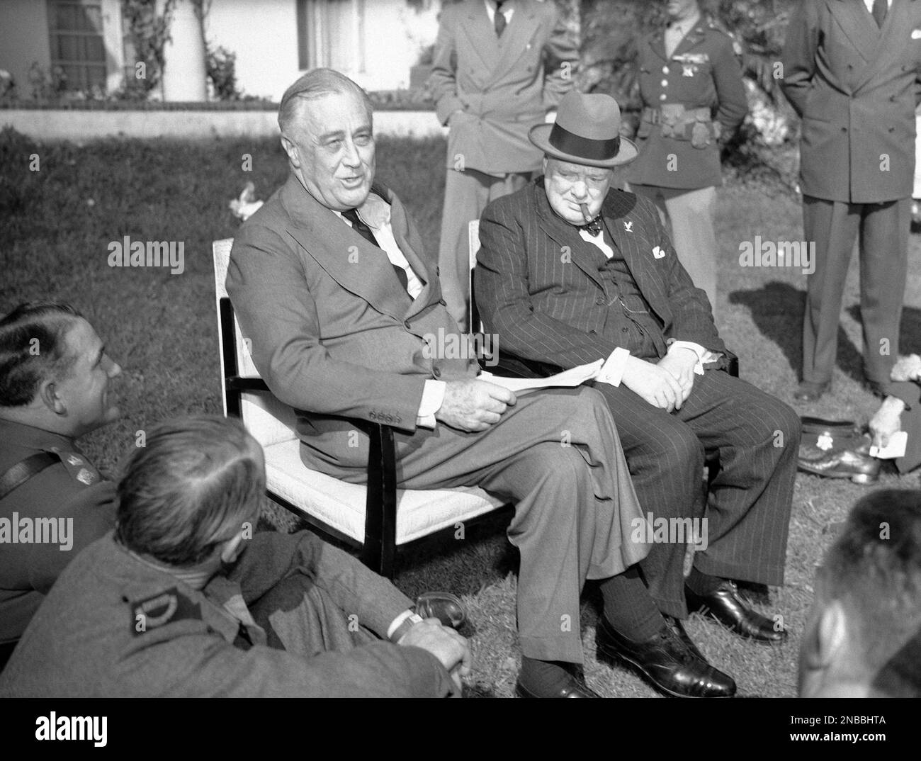 Furrowed brows and grim set jaws marked the faces of President Franklin ...