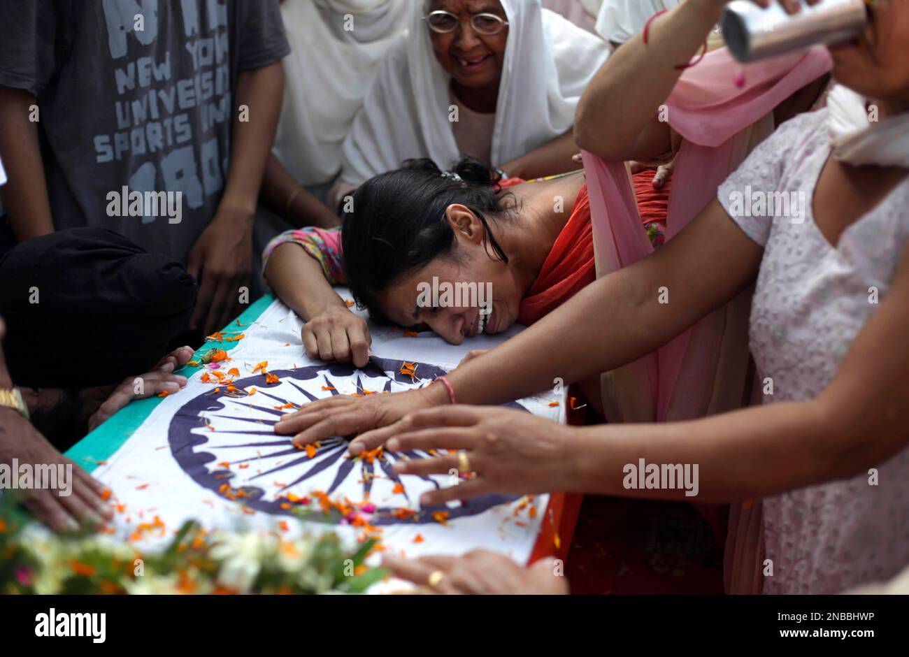 Sister of slain Indian army officer Lt. Navdeep Singh wails over the ...