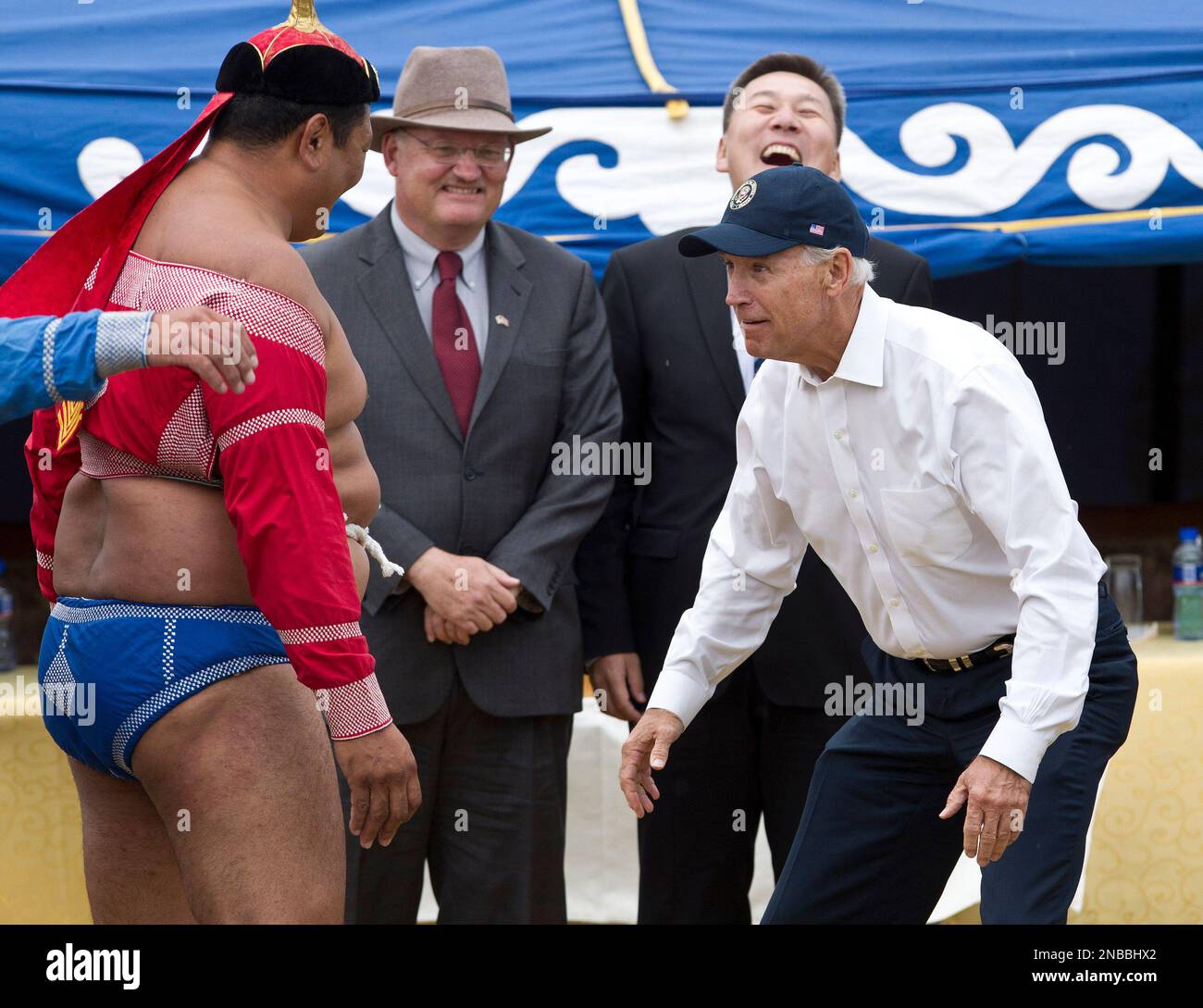 U.S. Vice President Joe Biden, right, meets Mongolian wrestler during ...