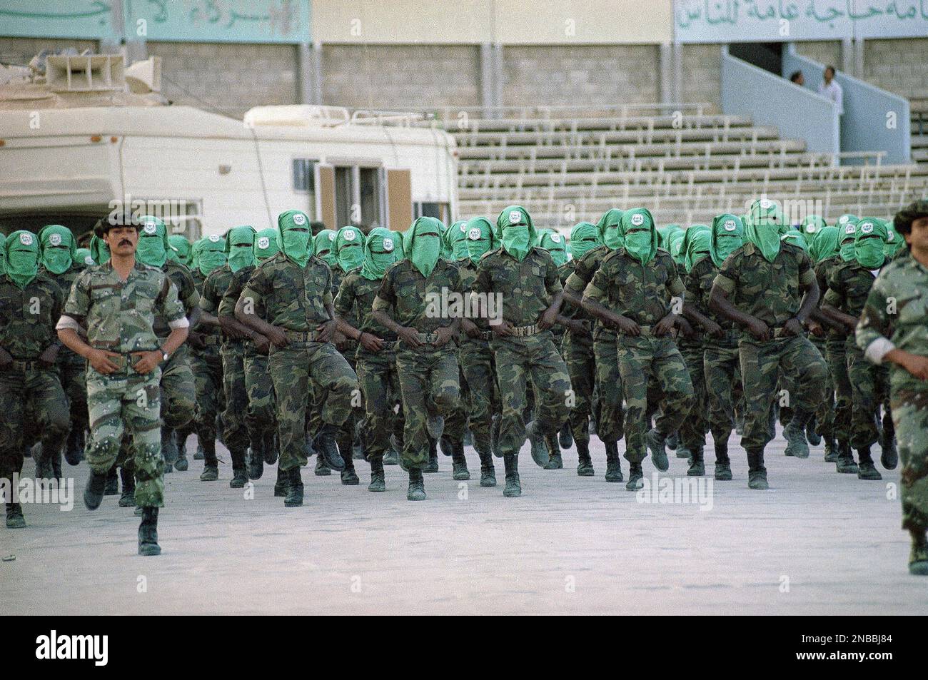 Libyan desert commando fighters parade in Tripoli stadium, Libya on ...