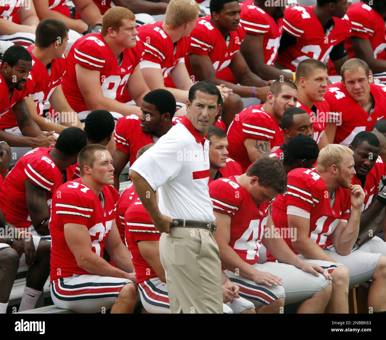 Ohio State head coach Luke Fickell, center, stands in front of his team ...