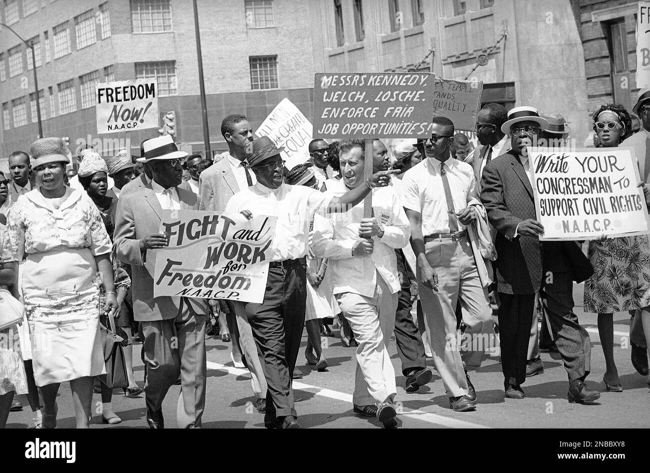 A racially mixed crowd of about 1,500 persons staged an hour-long ...