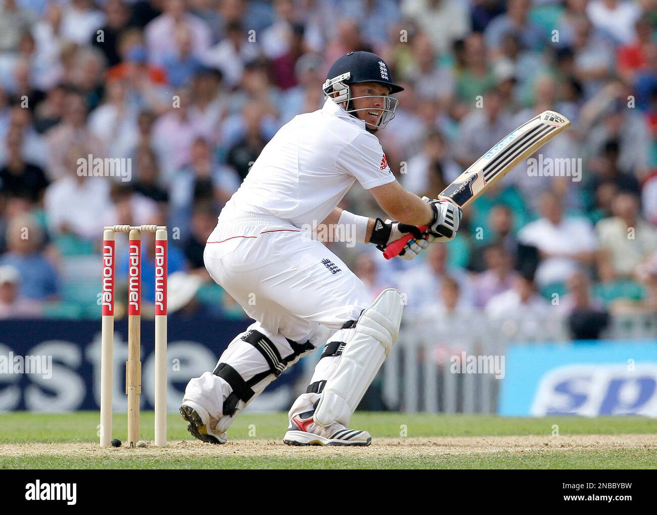 England's Ian Bell plays a shot off the bowling of India's Rudra Pratap ...