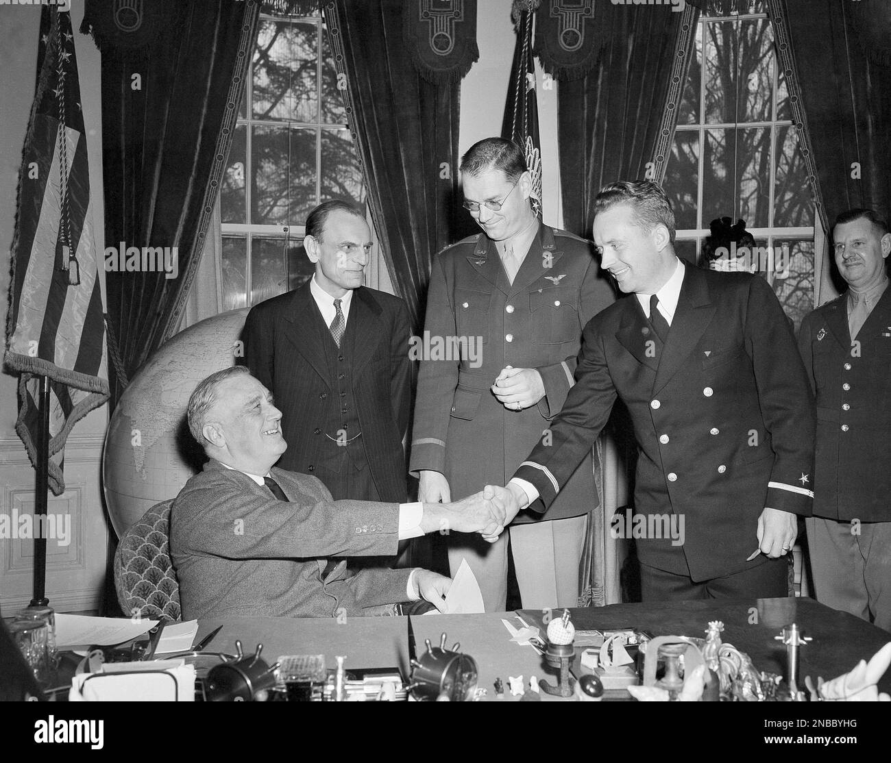 President Franklin D. Roosevelt congratulates Ensign Edmond I. Edwards ...