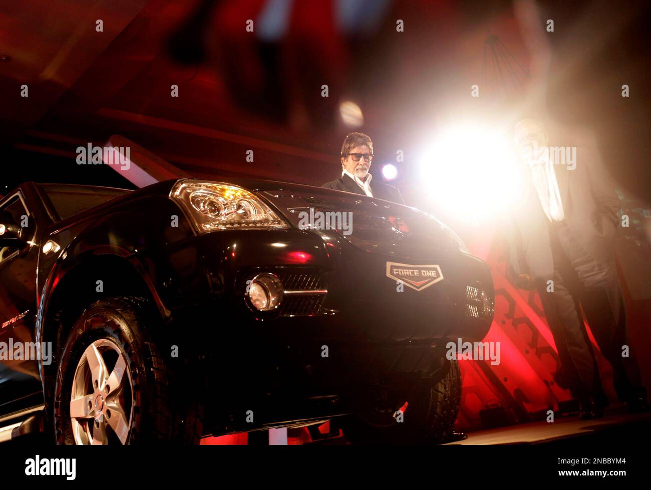 Bollywood actor Amitabh Bachchan poses with the newly launched Force ...