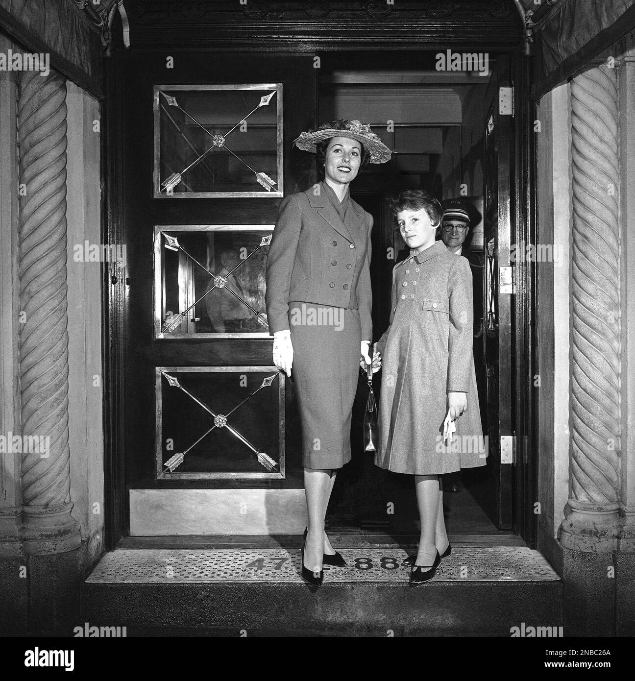 Setting out for a visit to a museum, Bess Myerson and daughter Barbara ...