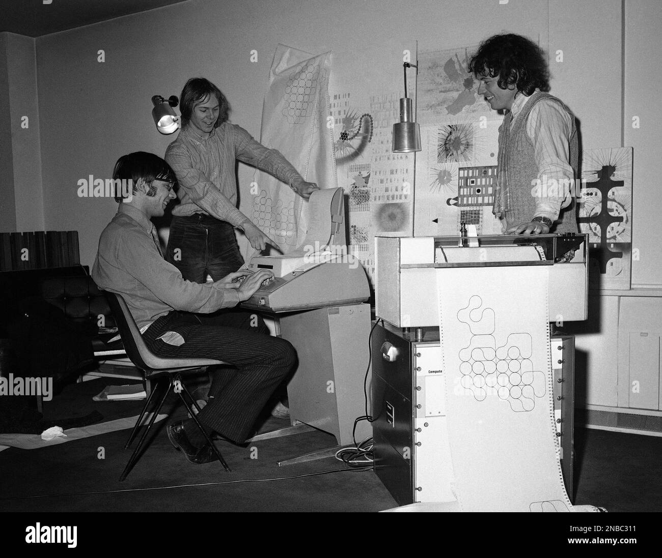 Artist Colin Sheffield, 32, from Twickenham, Middlesex, right, sees how ...