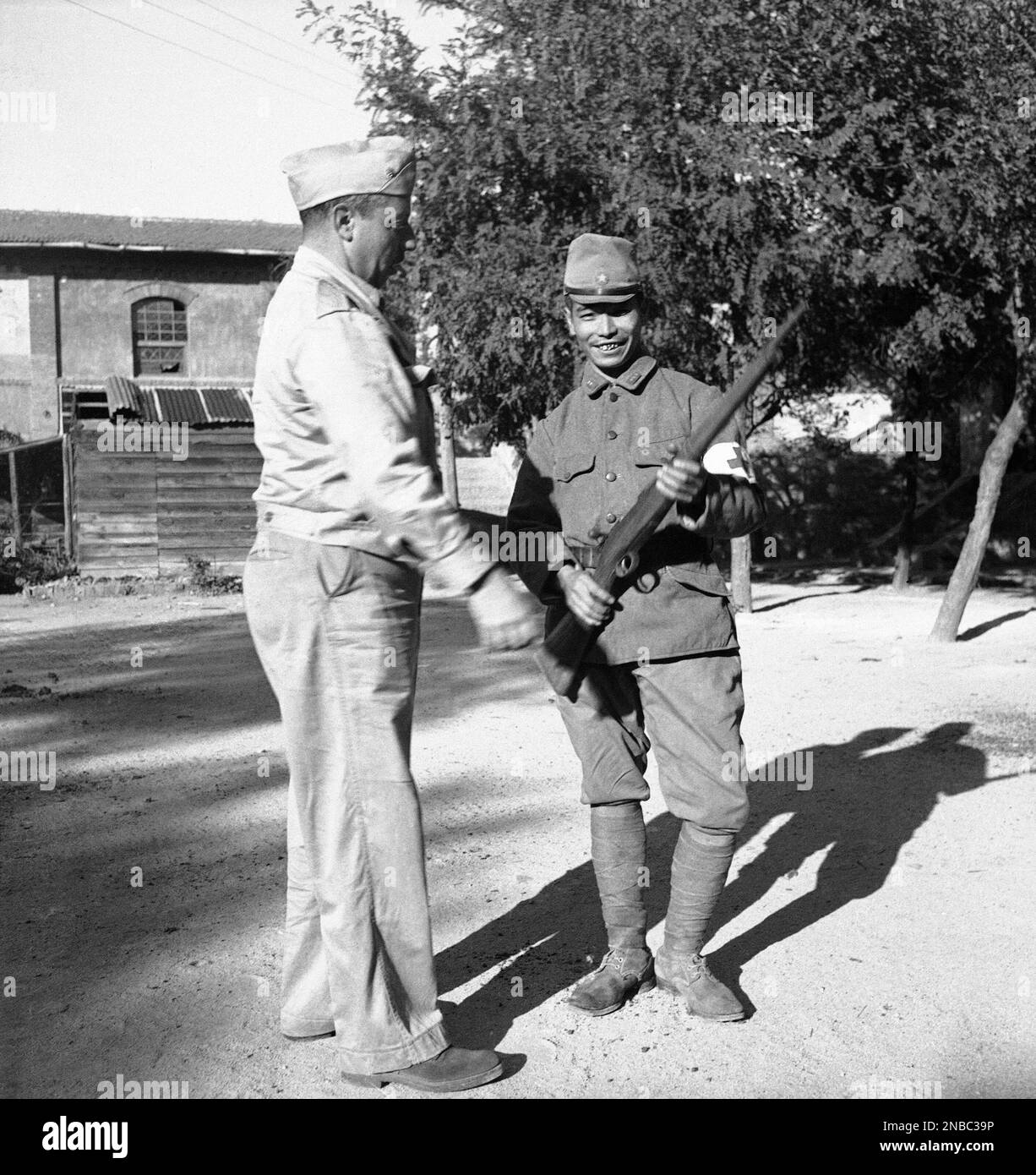 Photographer Charlie de Soria in China, helps disarm the Japanese army ...