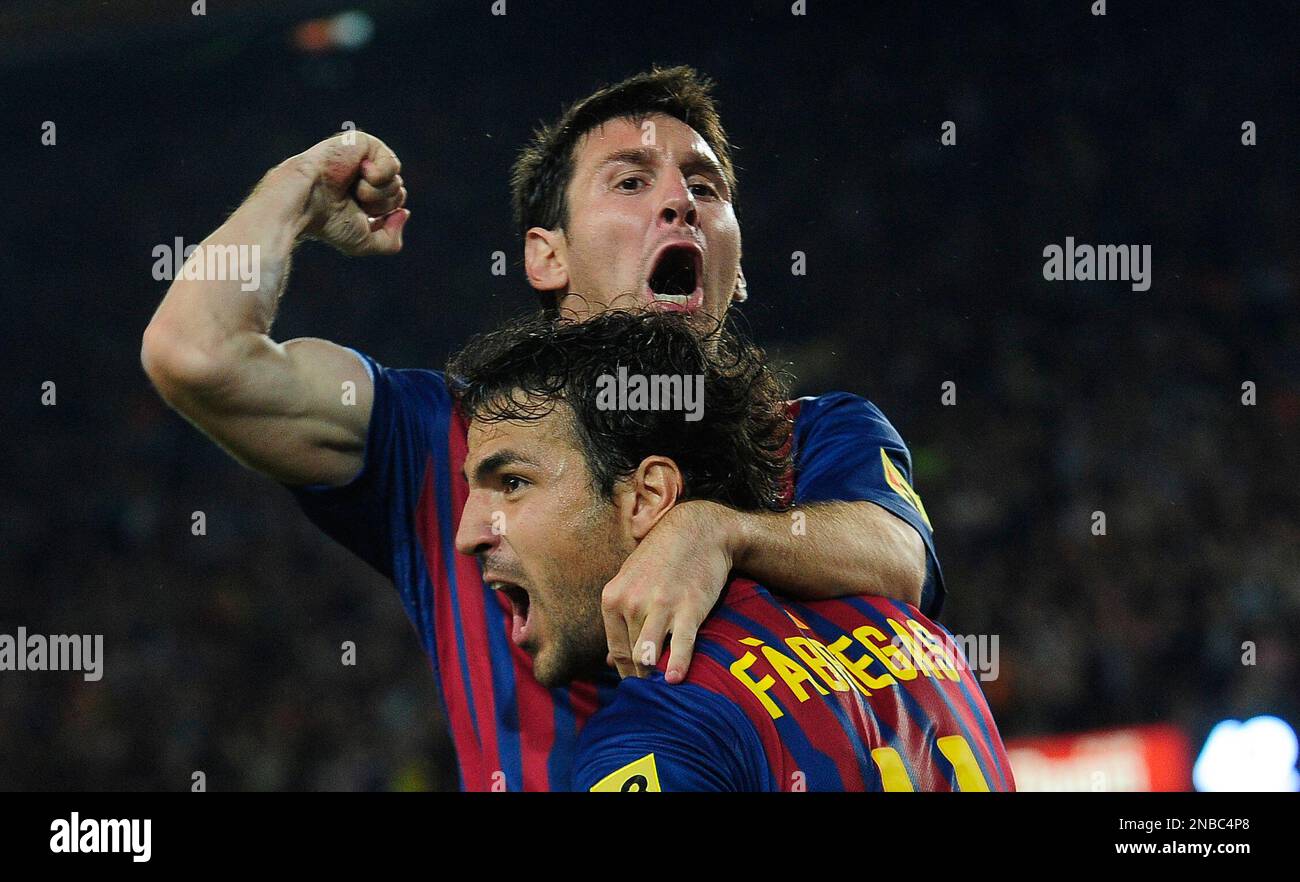 FC Barcelona's Lionel Messi from Argentina, left, reacts after scoring ...
