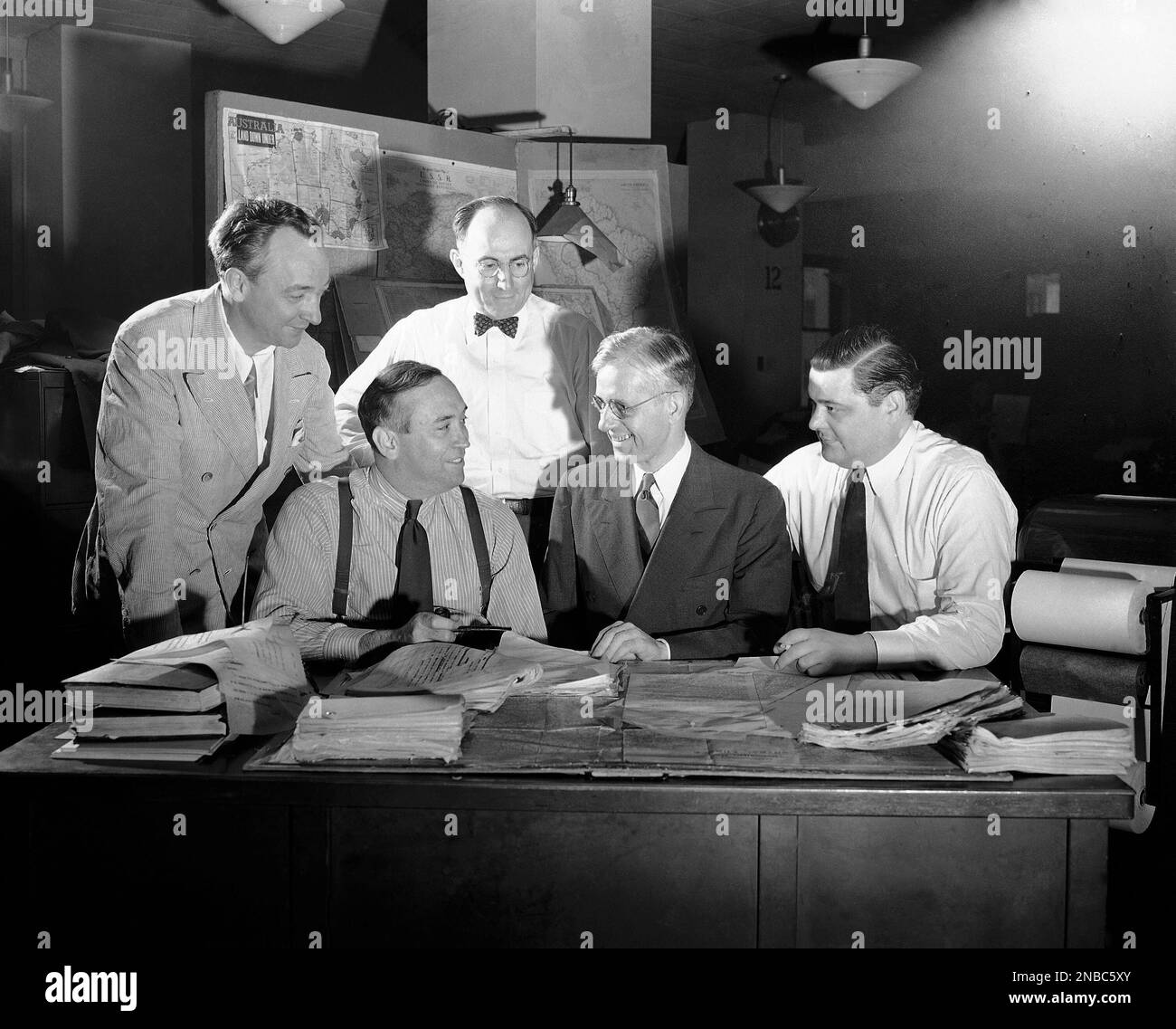 Gathered around Oliver Gramling, assistant general manager of Press ...