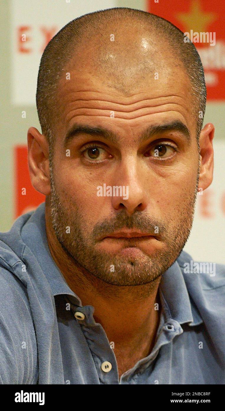 FC Barcelona's coach Josep Guardiola reacts during a press conference ...