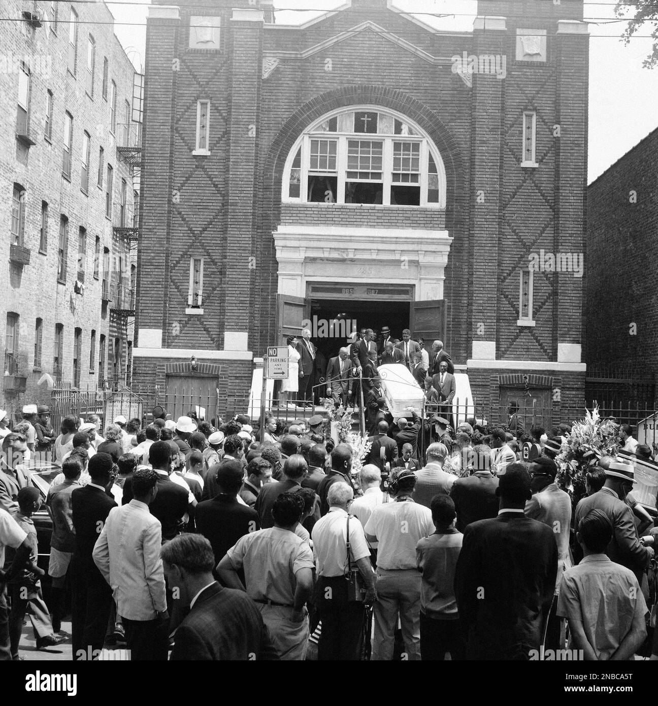 Crowd watches as casket containing the remains of 11-year-old Eric Dean ...