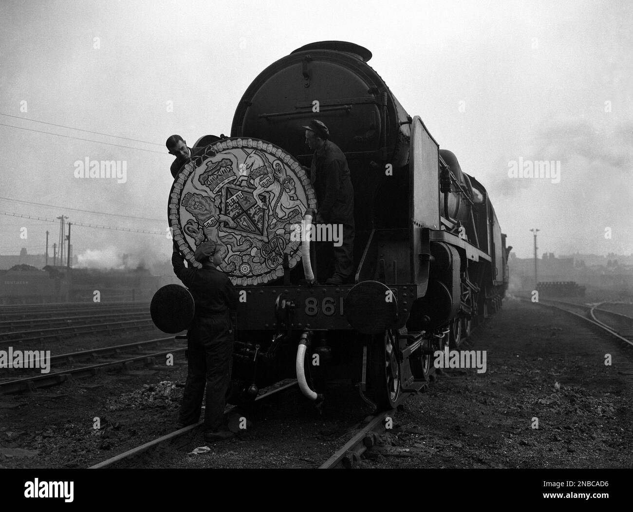 The colored headboard is placed in position on the front of the ...