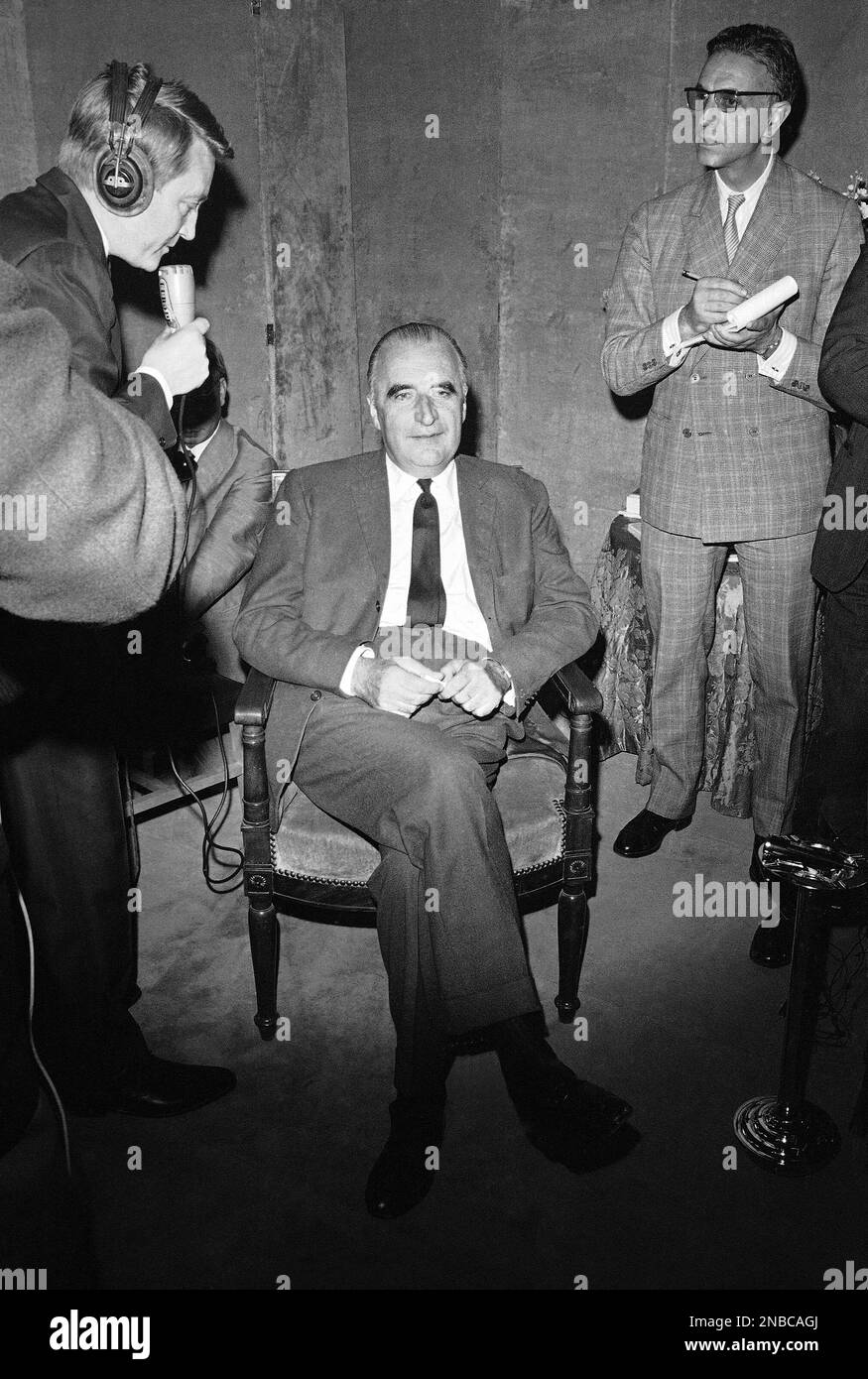 French Prime Minister Georges Pompidou, center, is questioned by ...