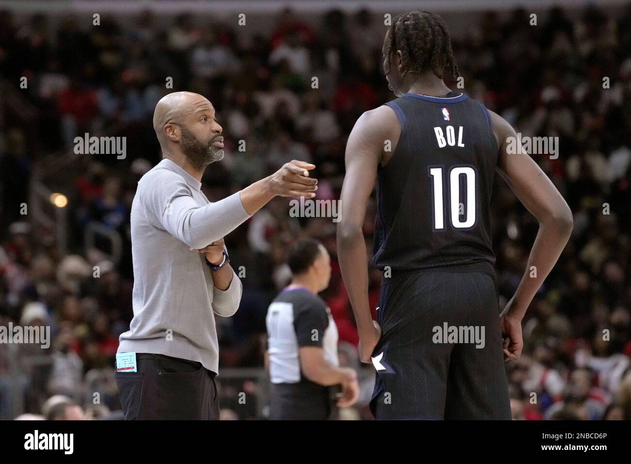 Orlando Magic head coach Jamahl Mosley talks with Bol Bol during the ...
