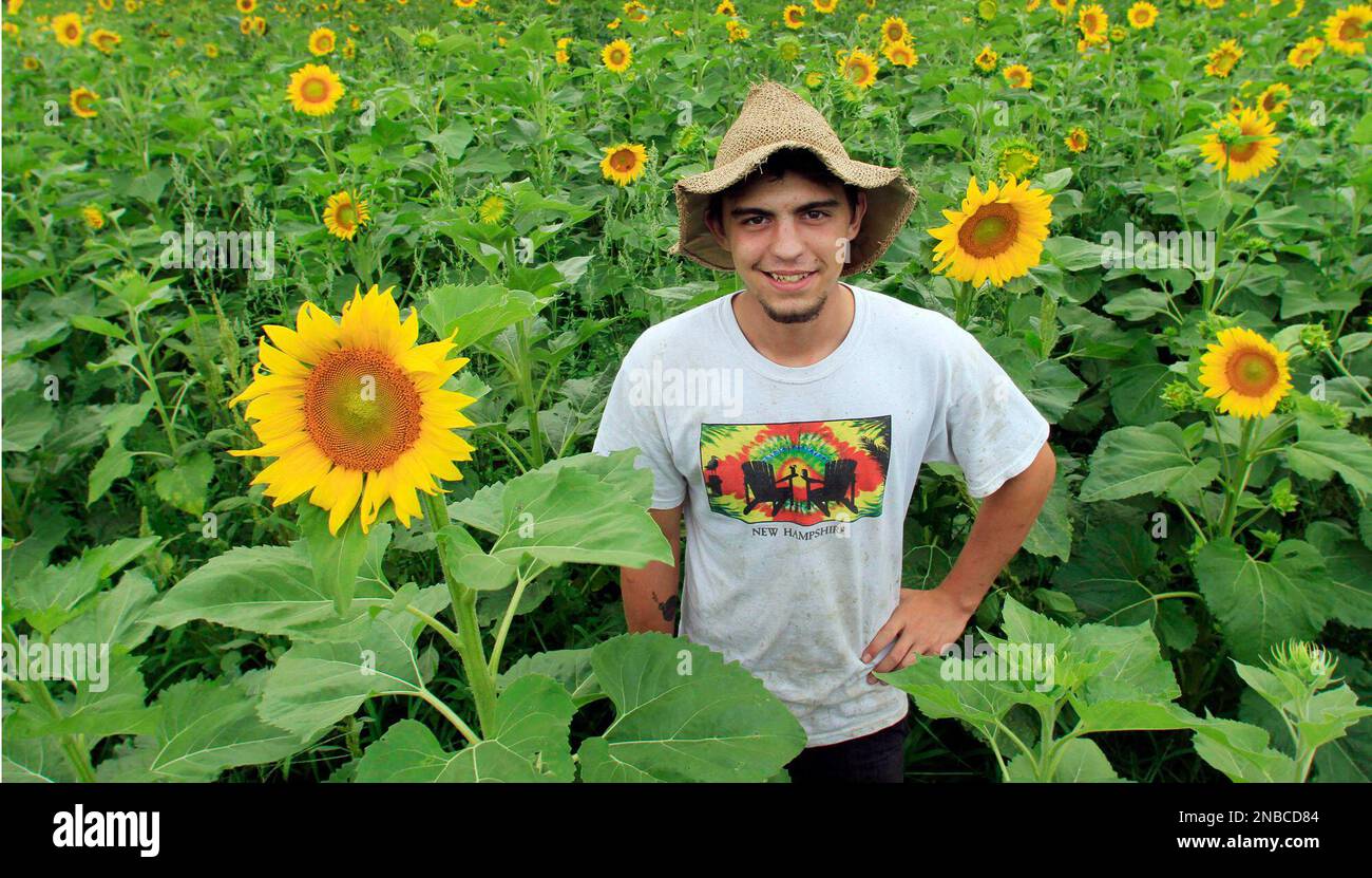 In this Aug. 9, 2011 photo, young farmer Patrick Gale smiles as he ...