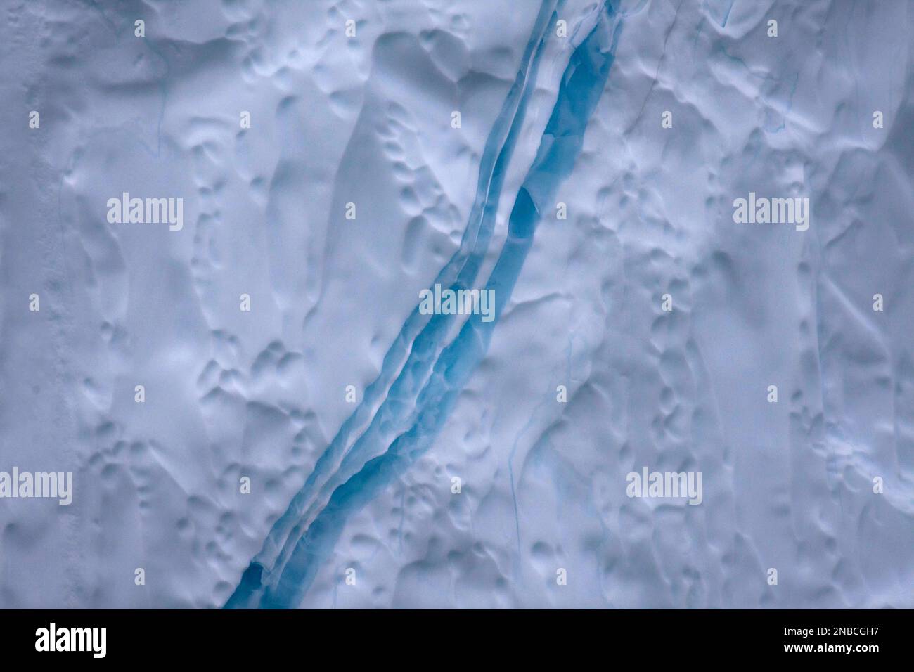 In this July 18, 2011 photo, a vein of highly-compacted blue ice runs ...