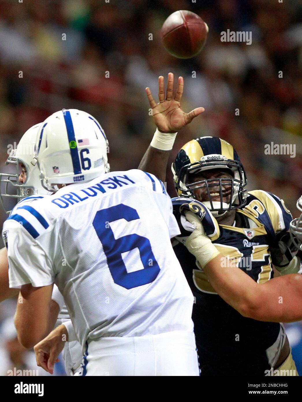 Indianapolis Colts quarterback Dan Orlovsky, left, throws as St. Louis ...