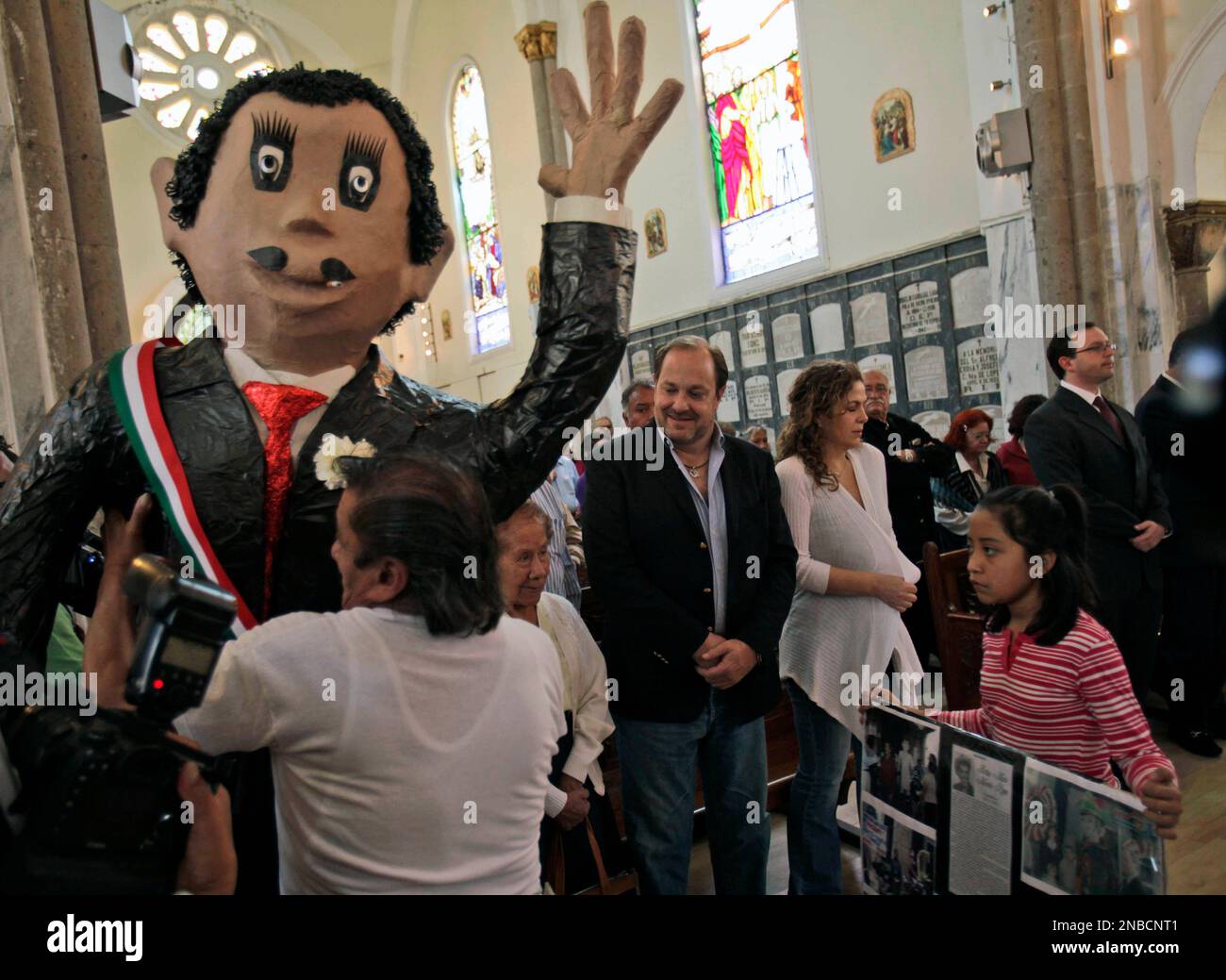 Mario Moreno, center, the adopted son of the late Mexican comedian and ...