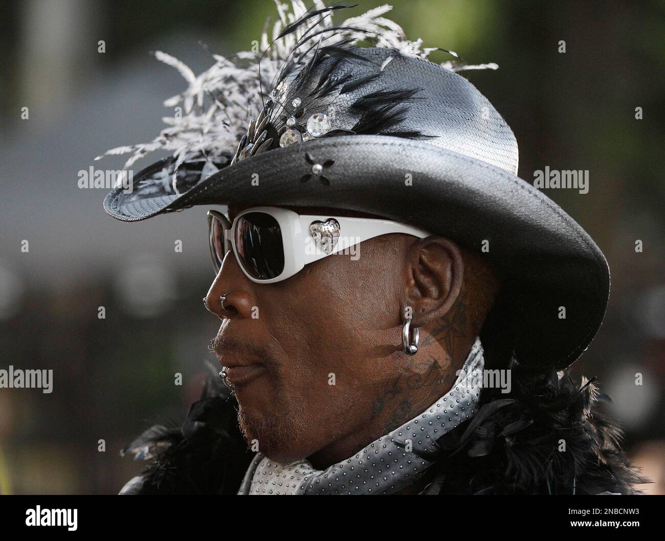 Former Chicago Bulls forward Dennis Rodman arrives at the Basketball ...