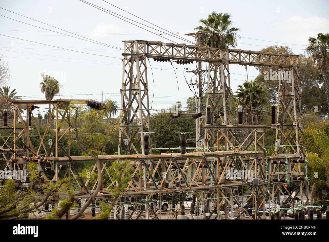 Daytime view of old, rusted crumbling electrical substation ...