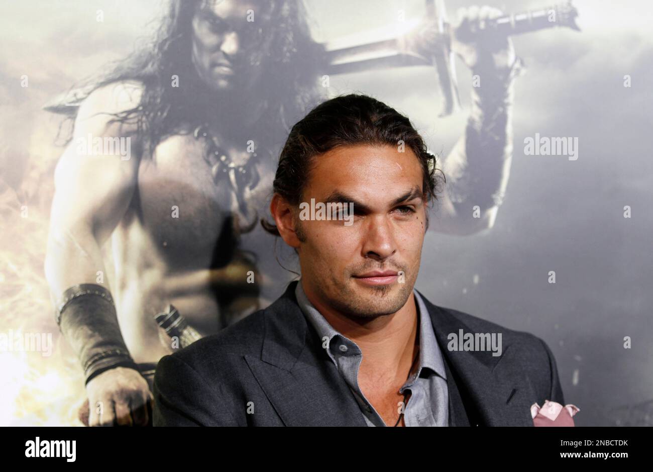 Cast member Jason Momoa arrives at the premiere of "Conan the Barbarian ...