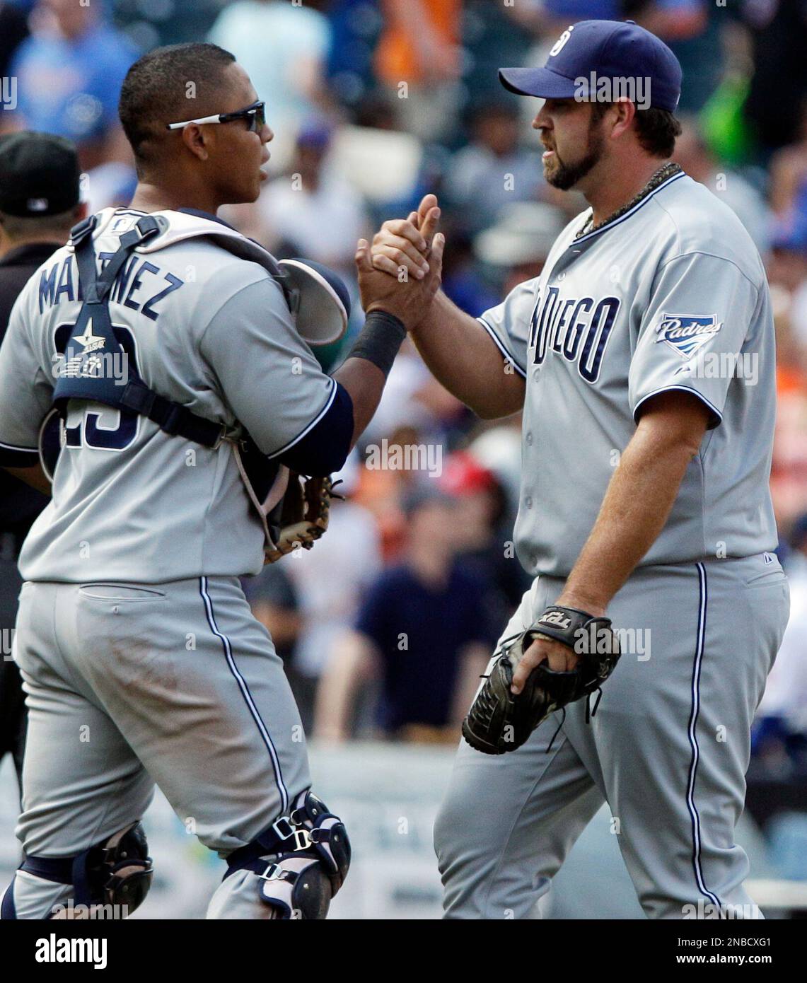 San Diego Padres catcher Luis Martinez, left, celebrates with teammate ...
