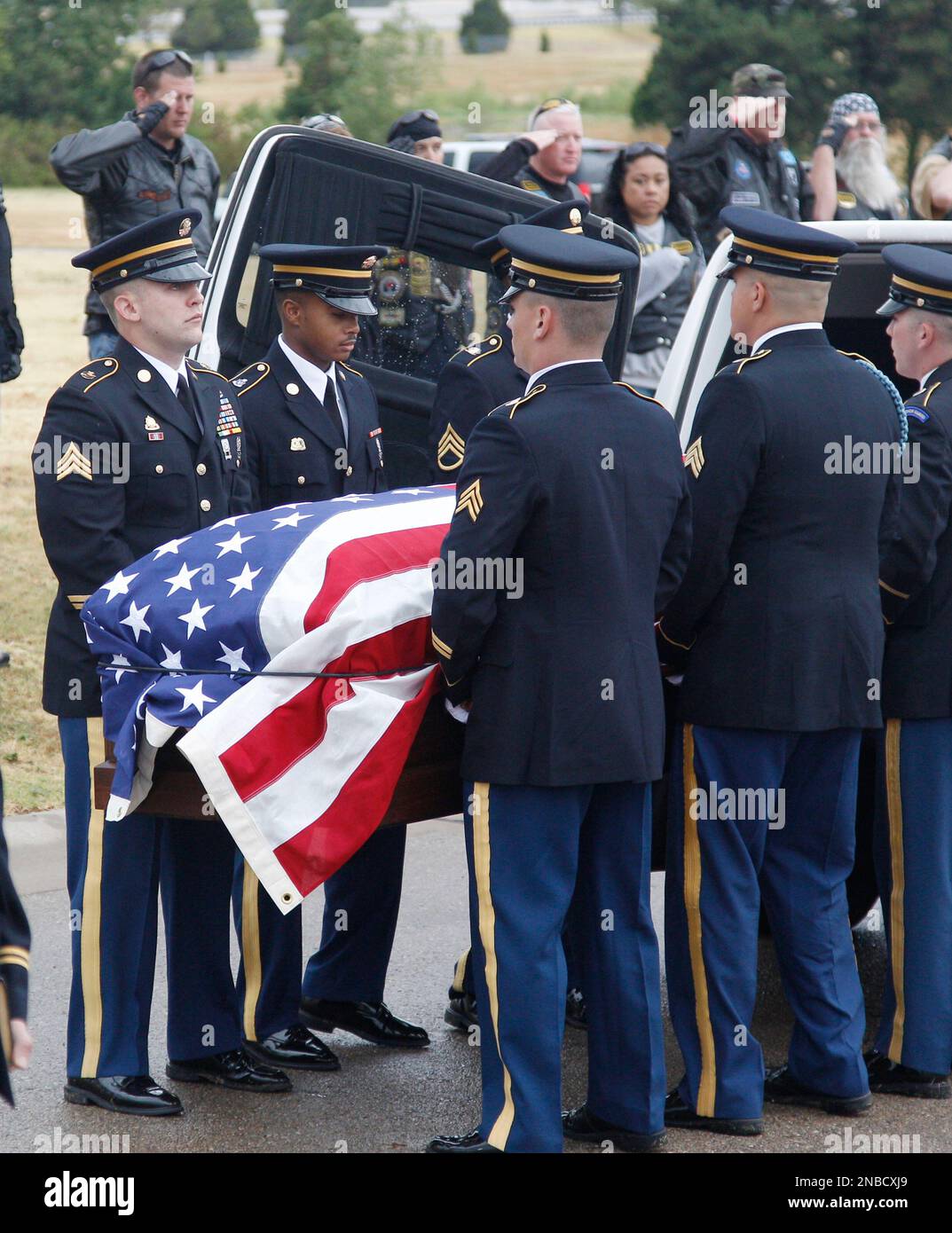 The flag draped casket of Oklahoma National Guard 2nd Lt. Jered W. Ewy ...