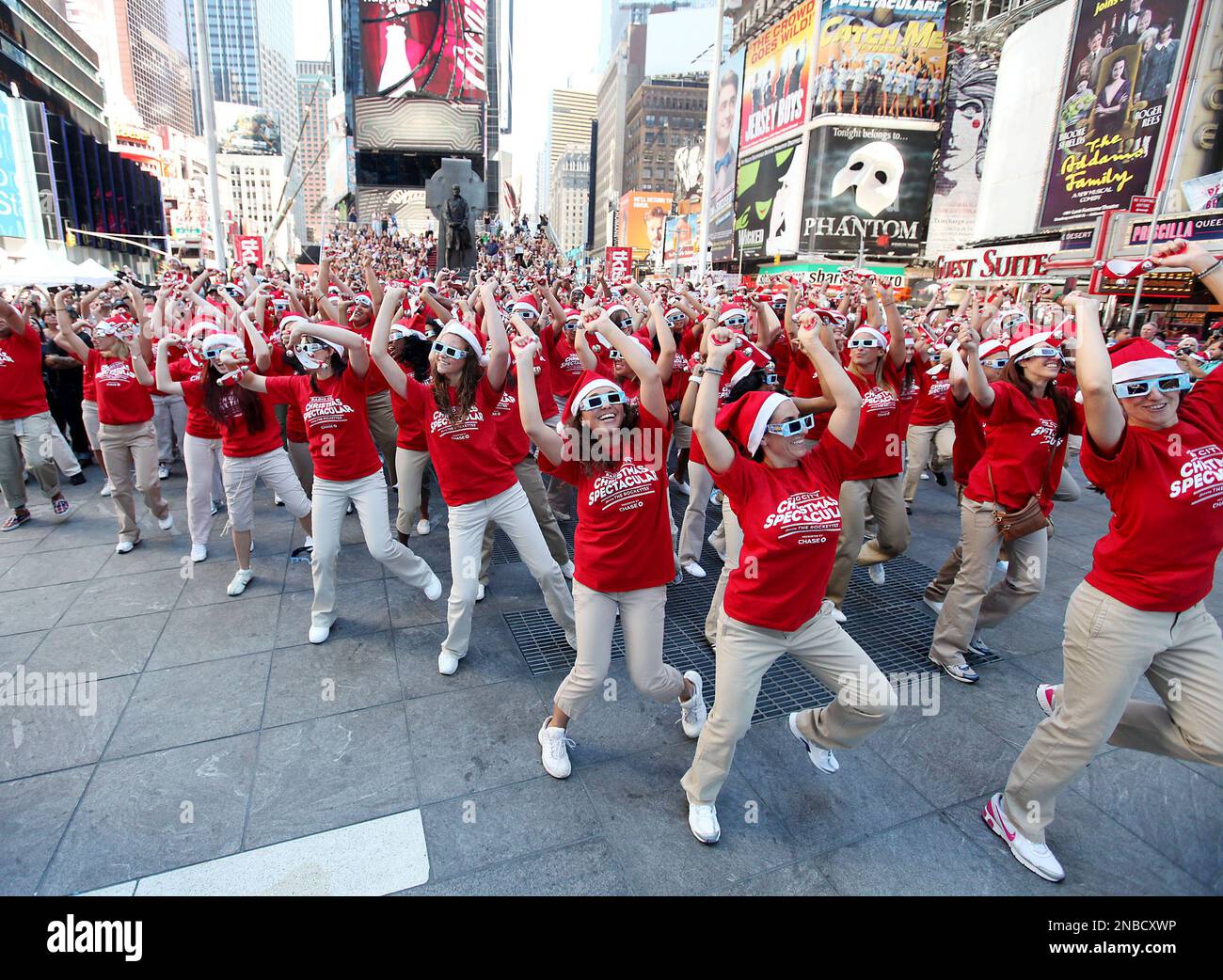 Dancers gather in Times Square to perform a choreographed routine to ...
