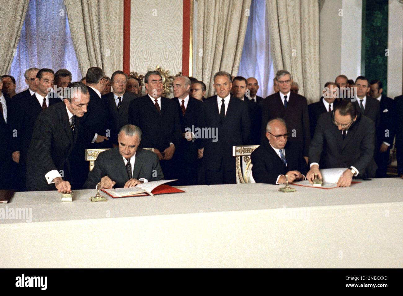 French President Georges Pompidou, left, signs the Soviet-French ...