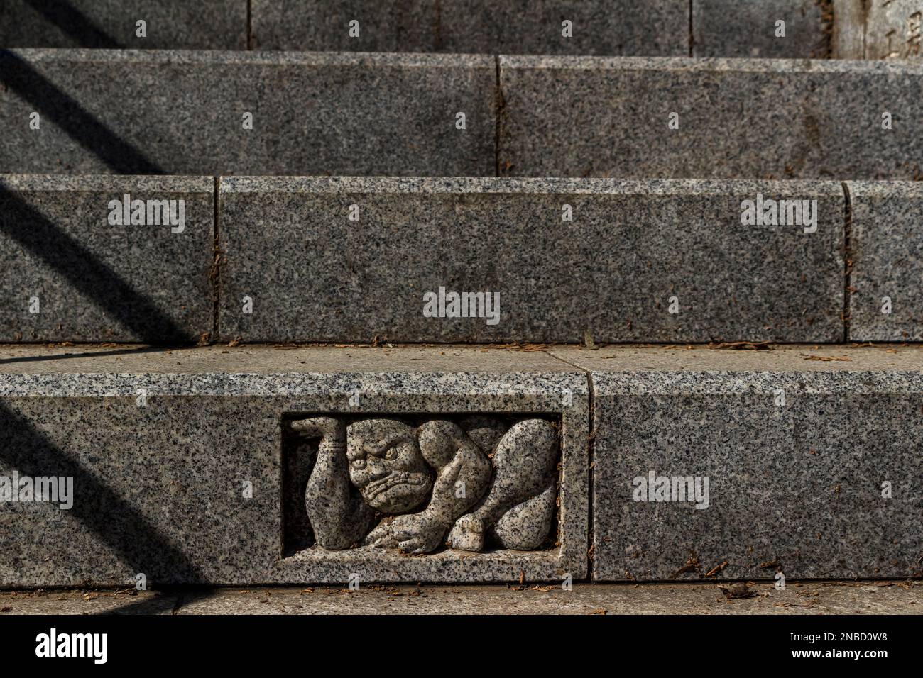 Musashi-Mitake-jinja(shrine), steps with carving of confined Demon ...